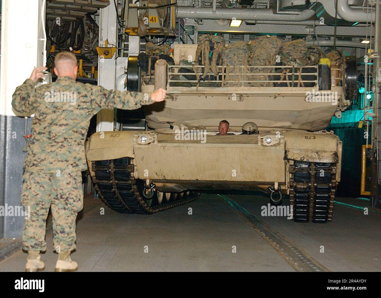 US Navy U.S. Marine Corps Staff Sgt. left, assigned to the 13th Marine ...