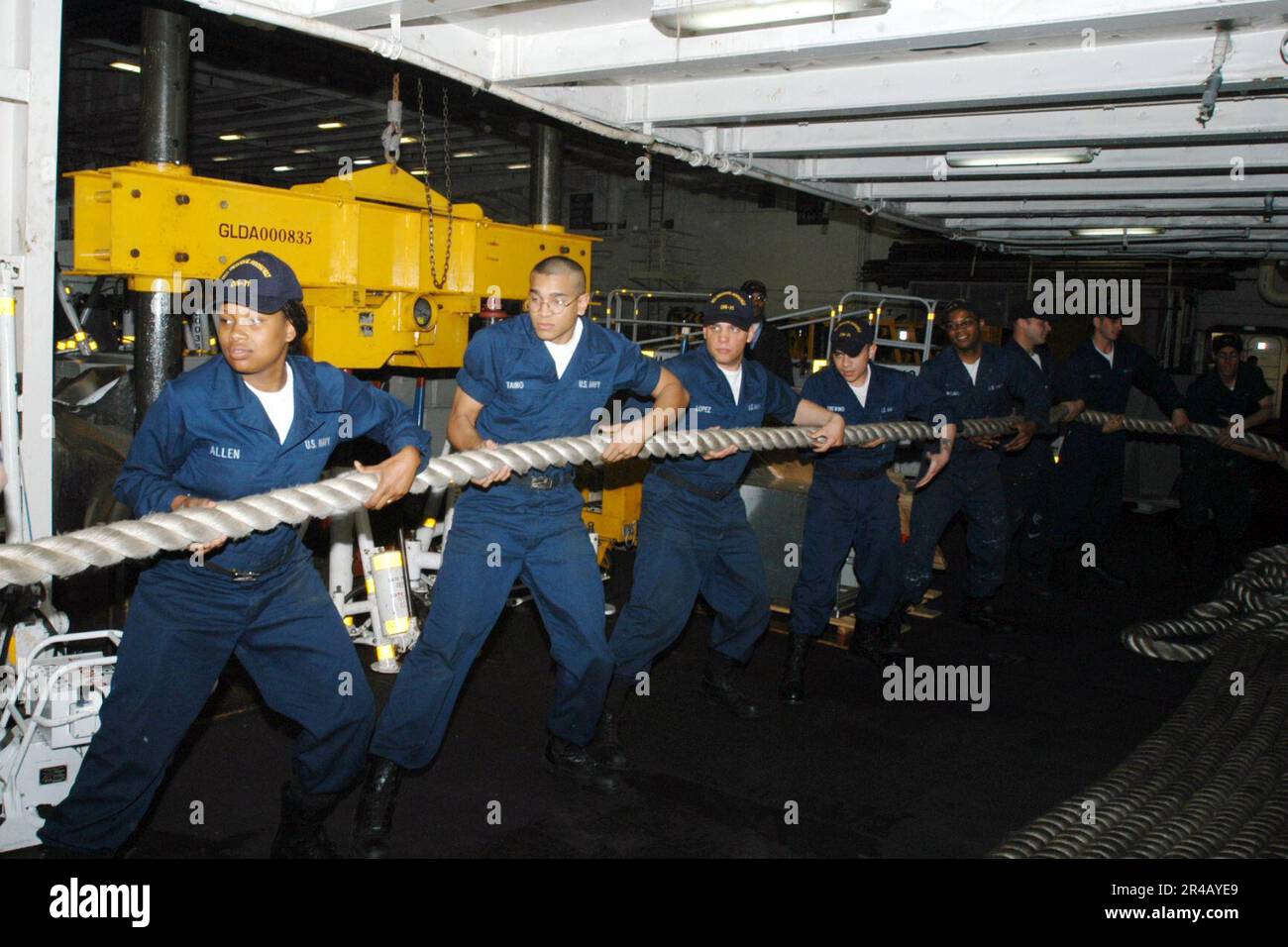 US Navy Sailors assigned to Deck Department's 2nd Division heave a ...