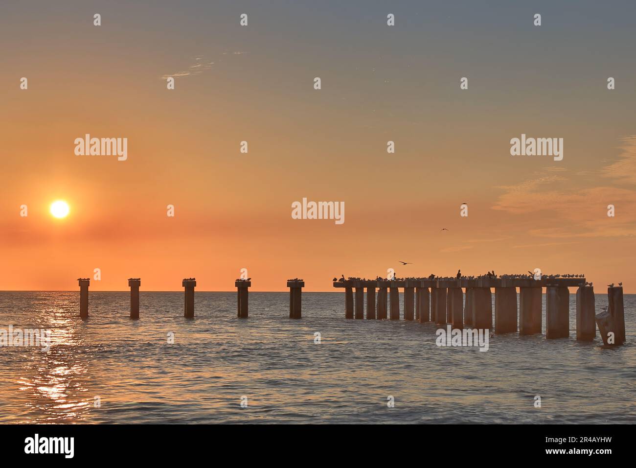 An idyllic sunset in Florida at Boca Grande Island, featuring a ...