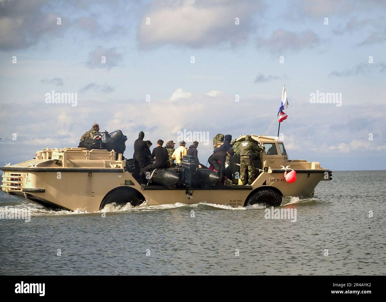 US Navy Underwater Construction Team Two (UCT-2) personnel launch an ...