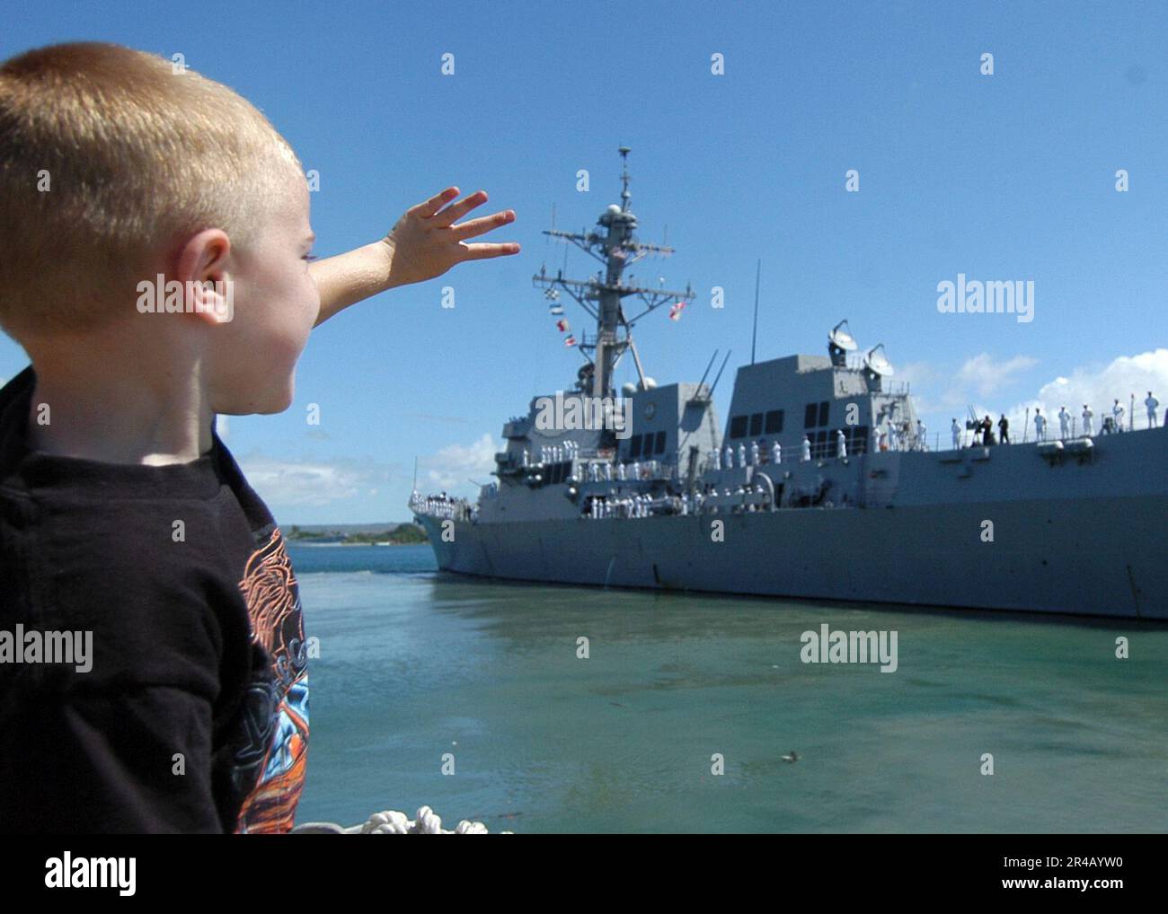 US Navy A family member of a Sailor stationed aboard the guided missile ...