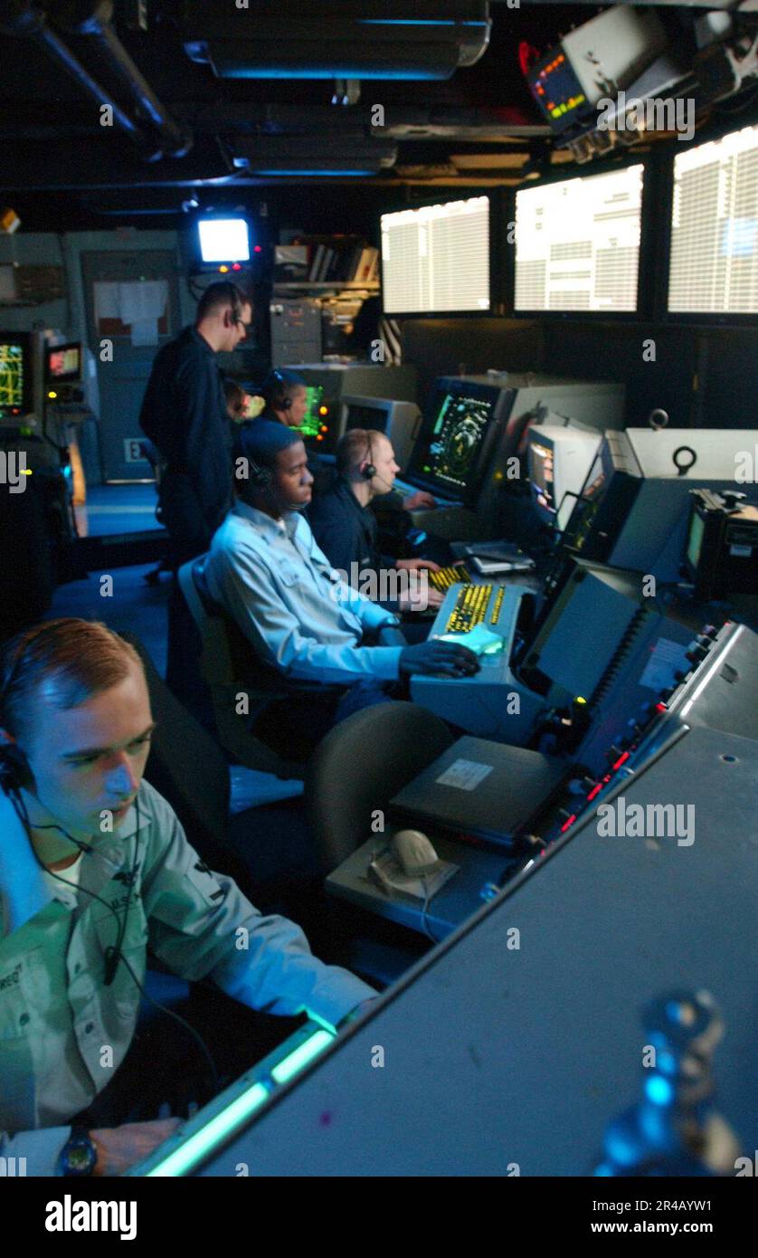 US Navy Air Traffic Controller 2nd Class standing, trains Air Traffic ...