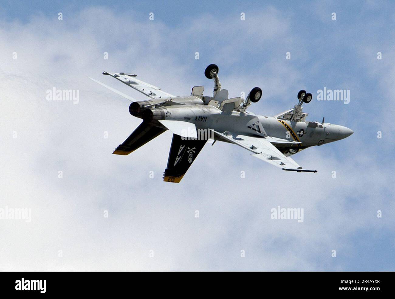 US Navy An F-A-18F Super Hornet performs the dirty roll maneuver ...