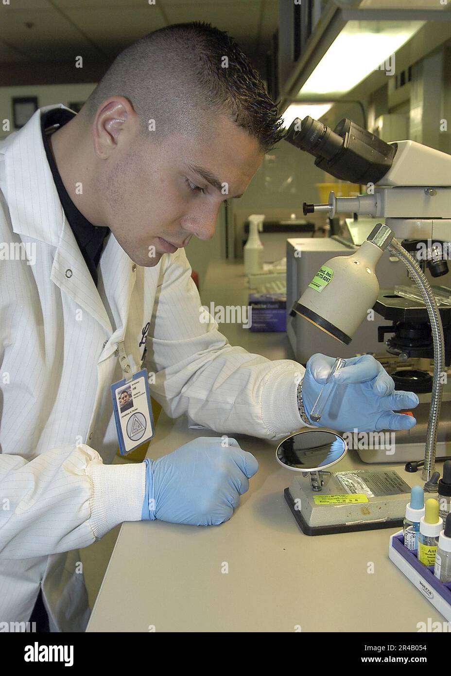 US Navy Hospitalman assigned to Naval Hospital Oak Harbor, verifies a ...