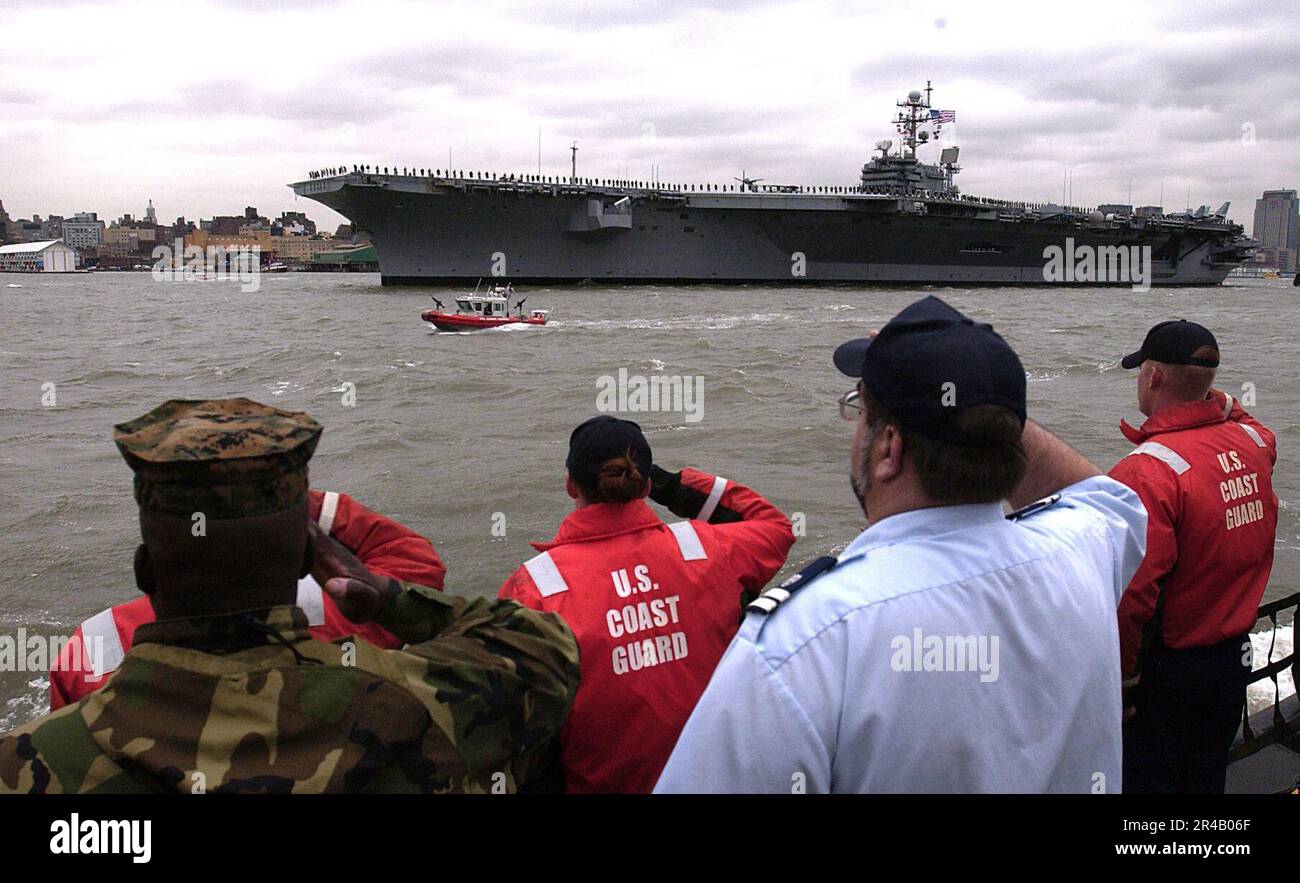 US Navy Service members from the Coast Guard and Marine Corps aboard ...