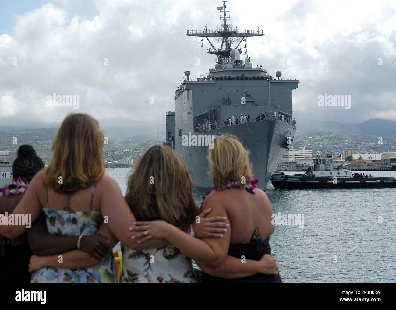 US Navy Family members of Sailors assigned to the dock landing ship USS ...