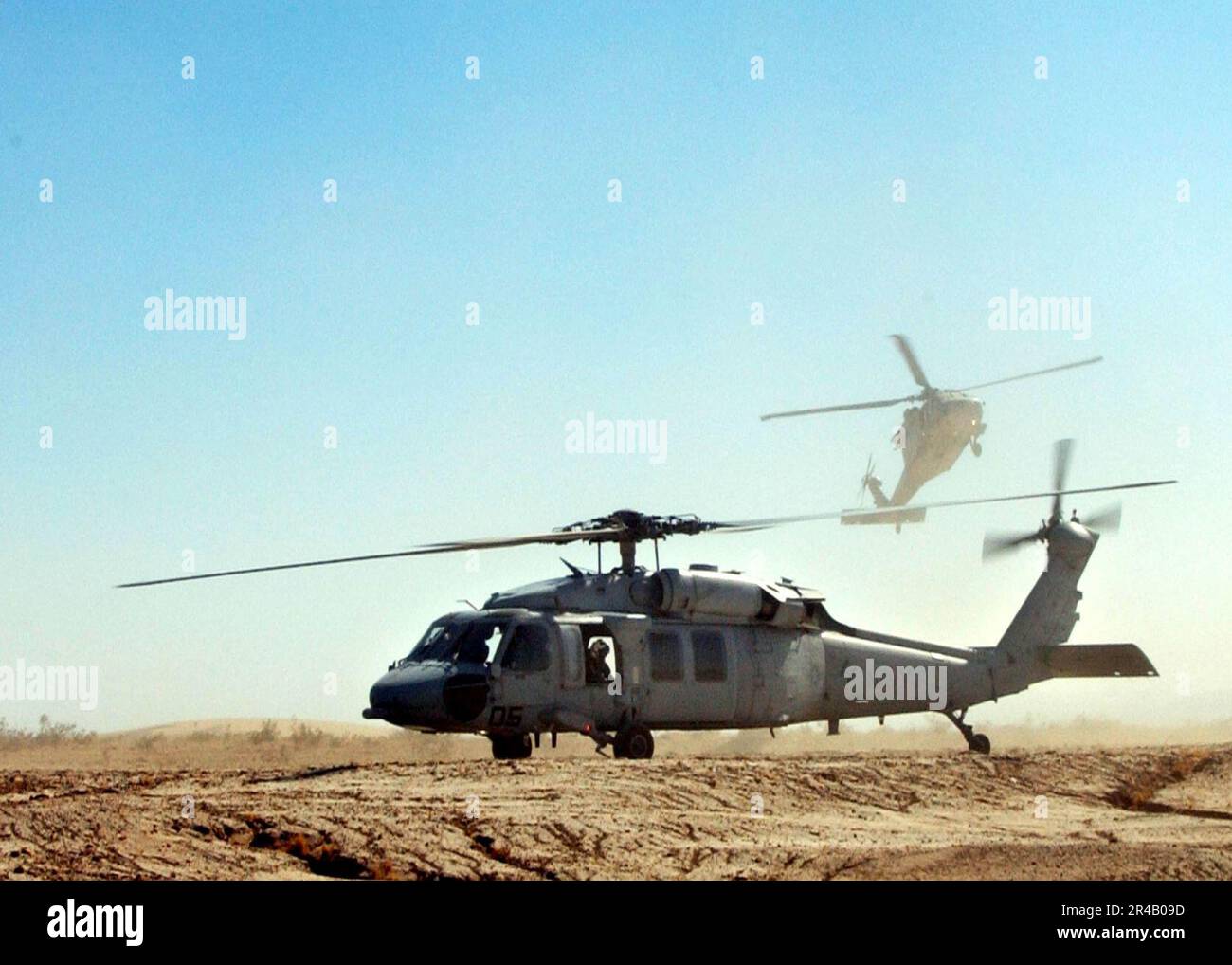 US Navy Two MH-60S Seahawk helicopters assigned to Helicopter Sea Combat Squadron Three (HSC-3 ...