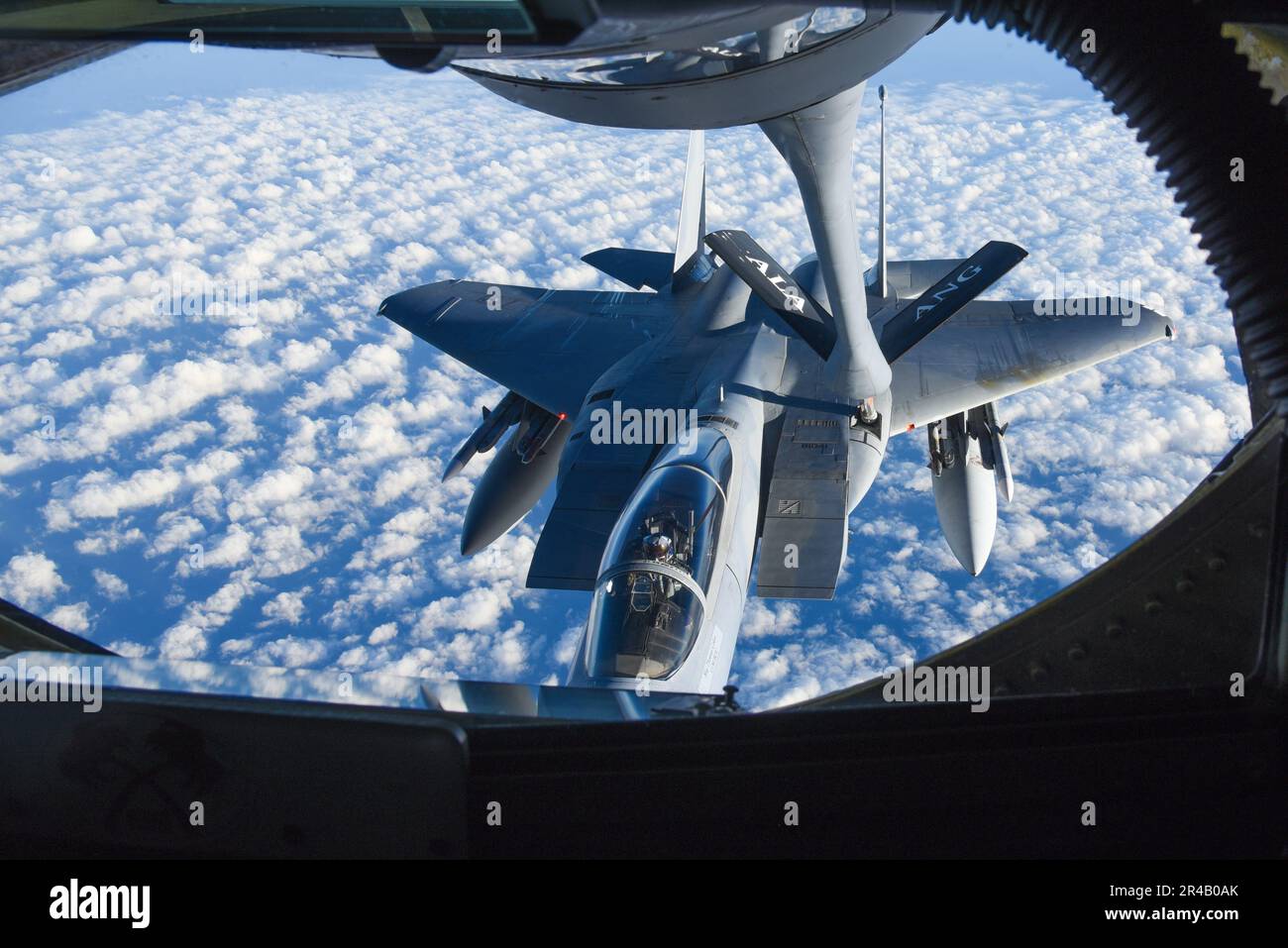 NORAD aircraft receive fuel via air refueling from a U.S. Air Force KC ...