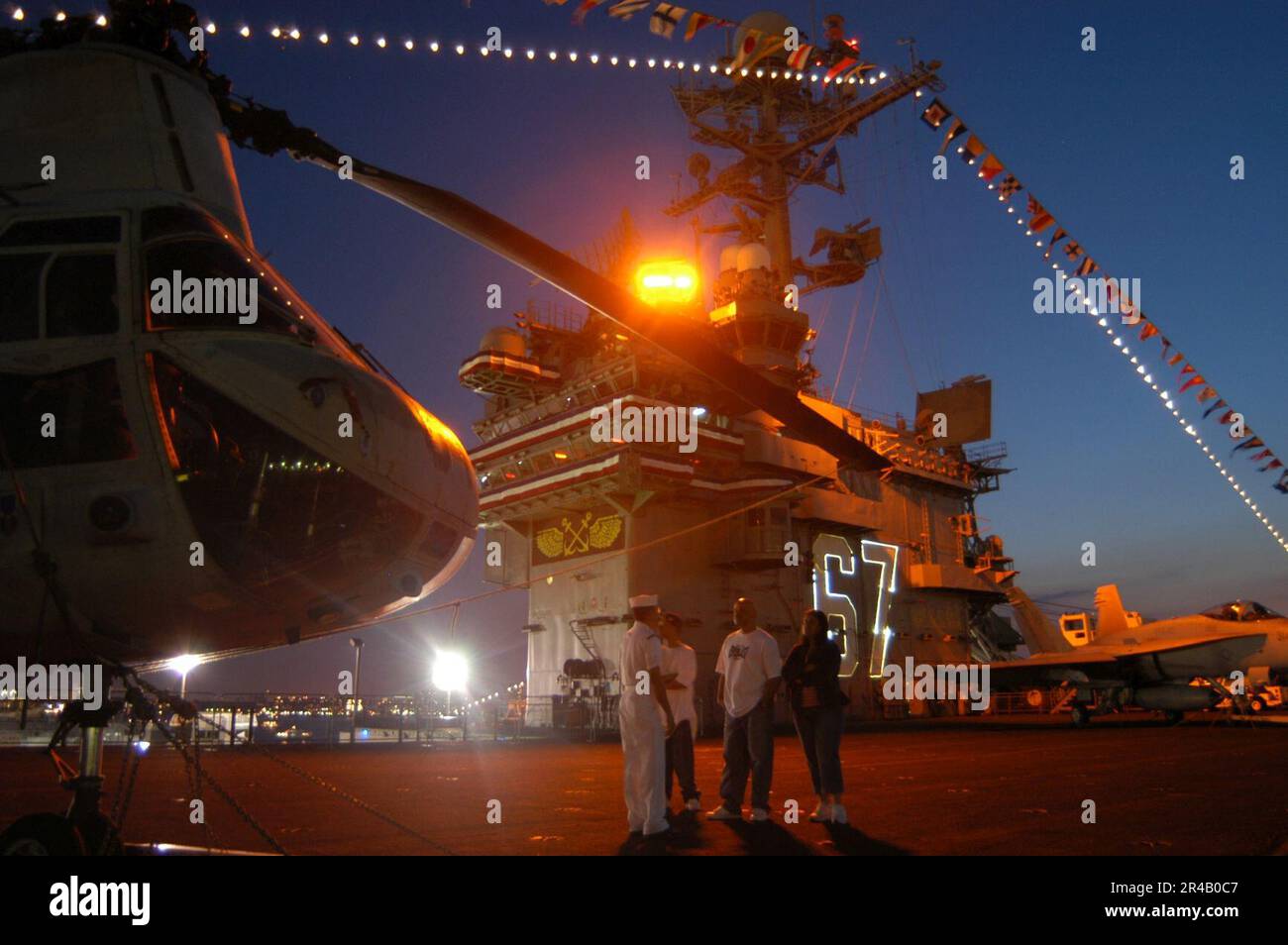 US Navy A Sailor gives an evening tour on the flight deck aboard the ...