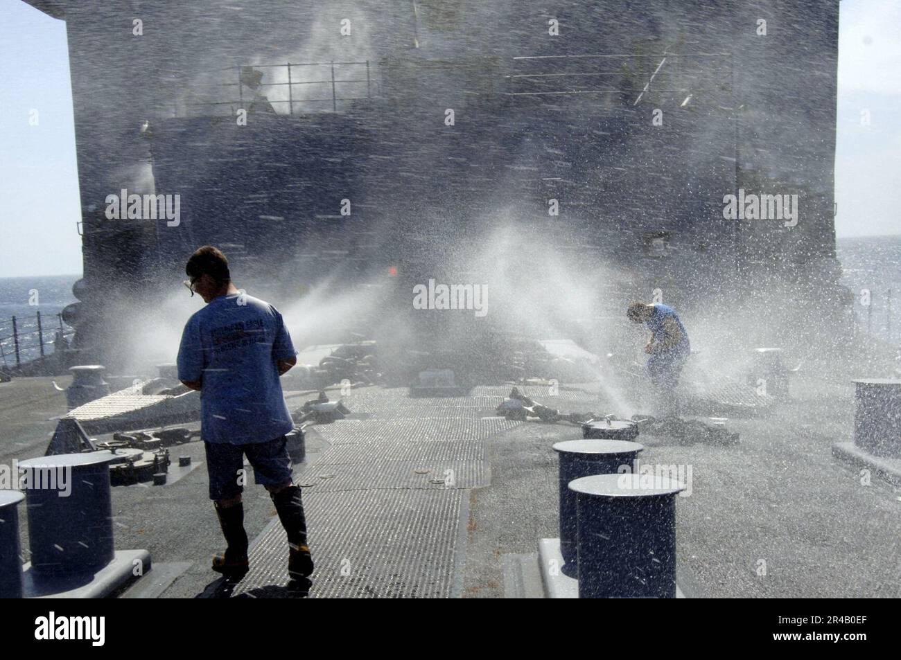 US Navy Damage Controlman 3rd Class Nicholas Wagner and Seaman Dariusz ...