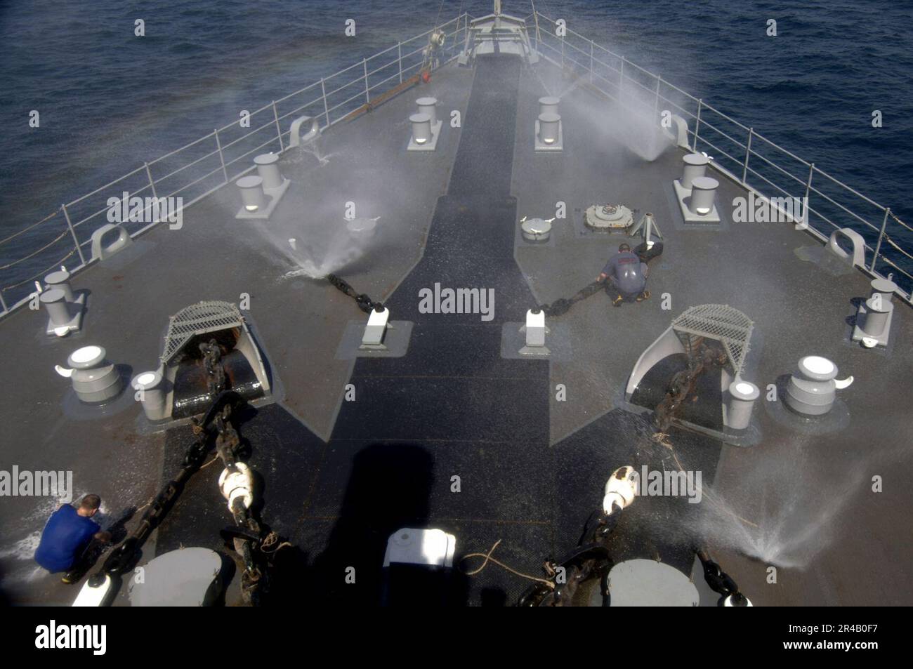 US Navy Damage Controlman 3rd Class Nicholas Wagner and Seaman Dariusz ...