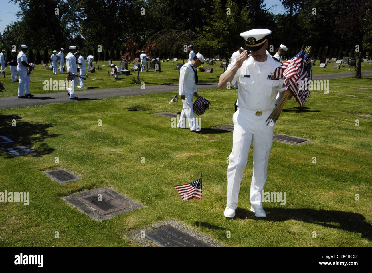 US Navy Naval Station Everett Chaplain, Lt. Cmdr. renders a salute ...