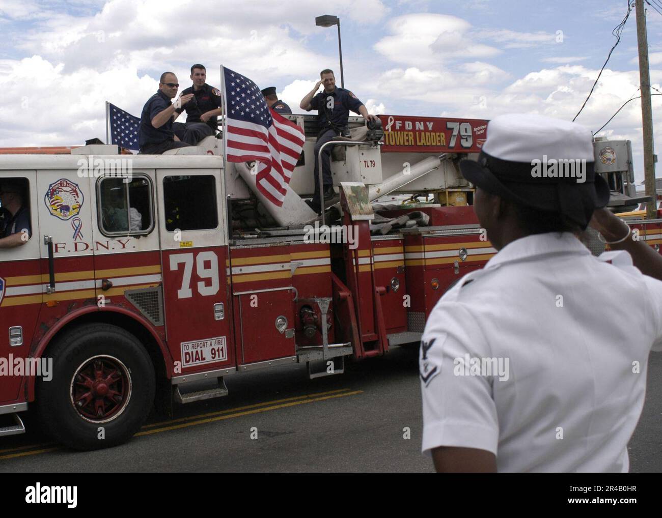 US Navy New York City firefighters salute military members during Fleet ...
