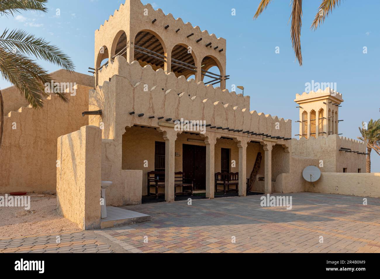 A contemporary recreation of an antique Arabic village nestled behind a canyon in the desert of ...