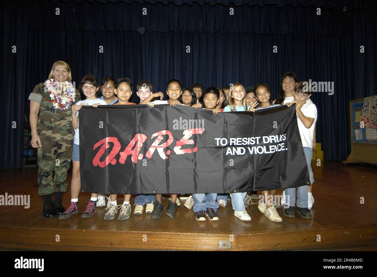 US Navy Master-at-Arms 1st Class stands with her recent class of Drug ...