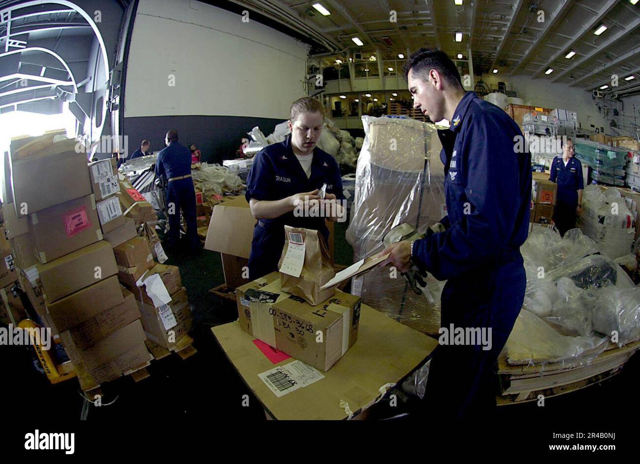 US Navy Machinist Mate 1st Class and Store Keeper 2nd Class prepare ...