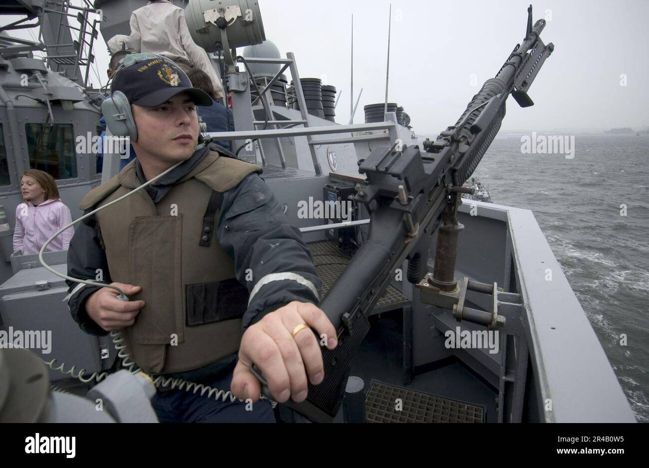 US Navy Gunner's Mate 3rd Class stands force protection watch with an M ...