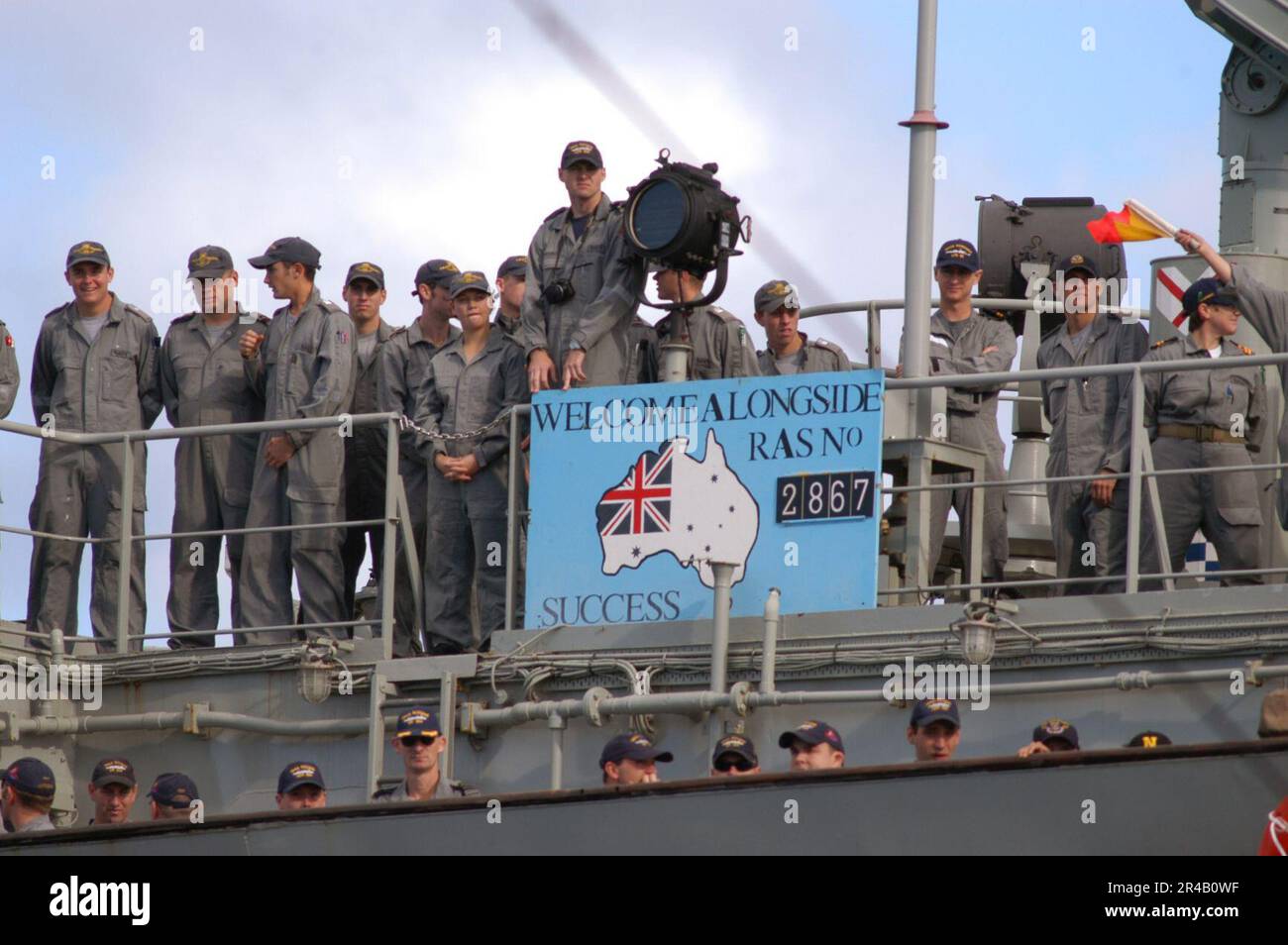 US Navy Crew members assigned to the Royal Australian Navy HMAS Success ...