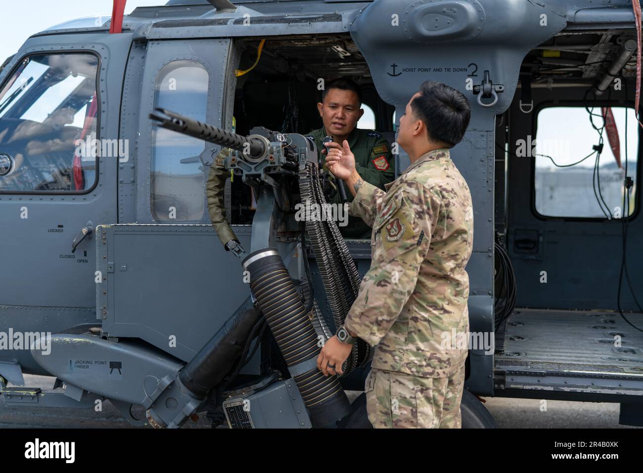 U.S. Air Force Staff Sgt. Kristian Reyes, right, 33rd Rescue Squadron ...