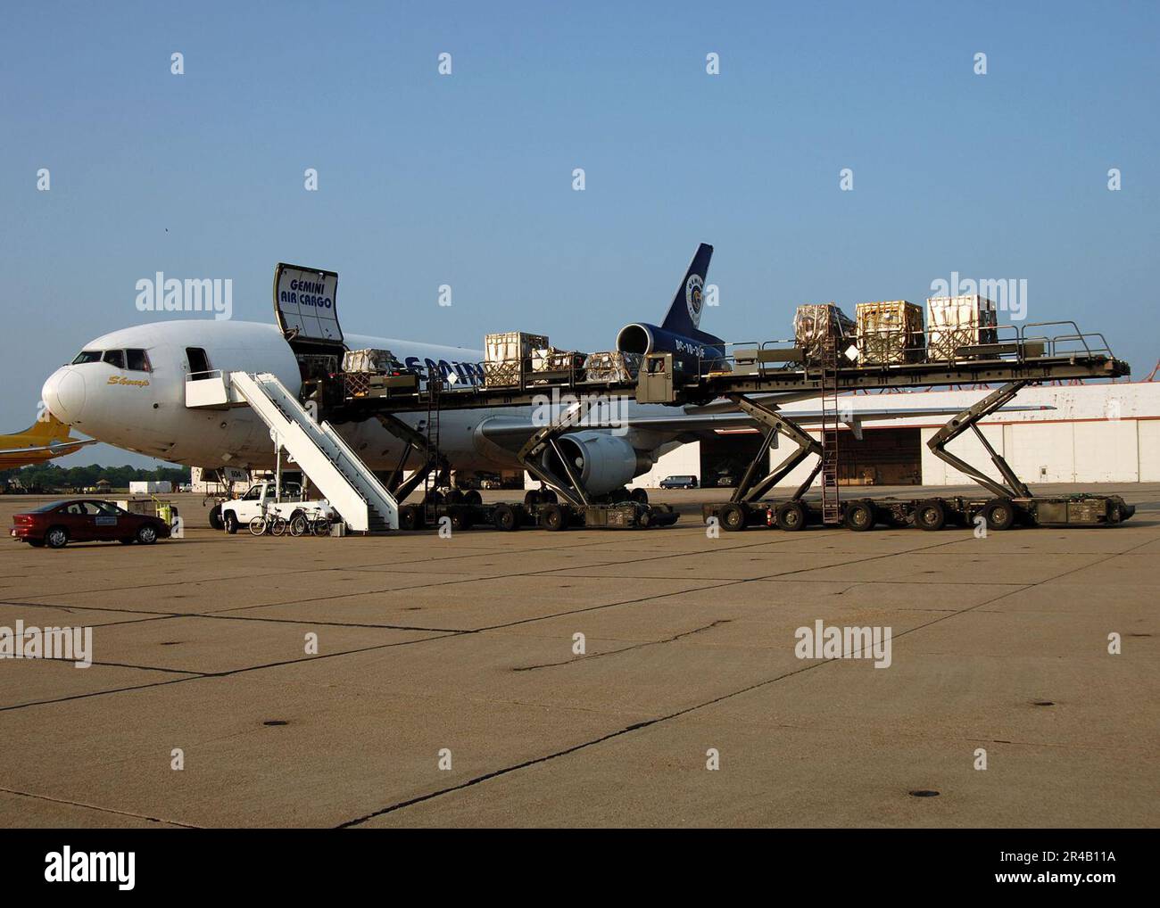 US Navy A 60K Loader transports diving equipment from Mobile Diving and ...