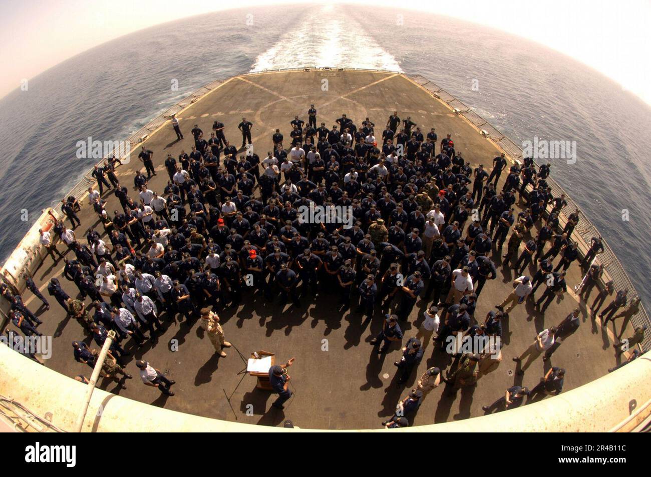 US Navy Commanding Officer, Capt. addresses the crew during an all ...