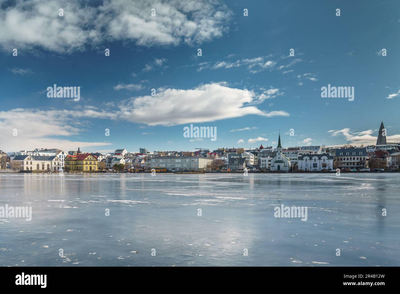 The Reykjavik City Pond Tjörnin and two churches, hallgrimskirkja and ...