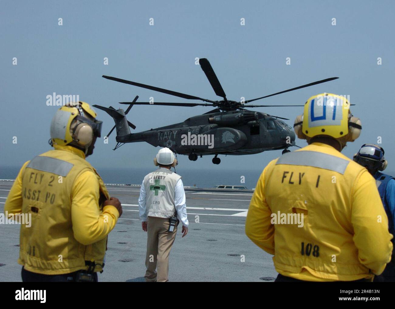 US Navy Flight deck personnel aboard the Nimitz-class aircraft carrier ...
