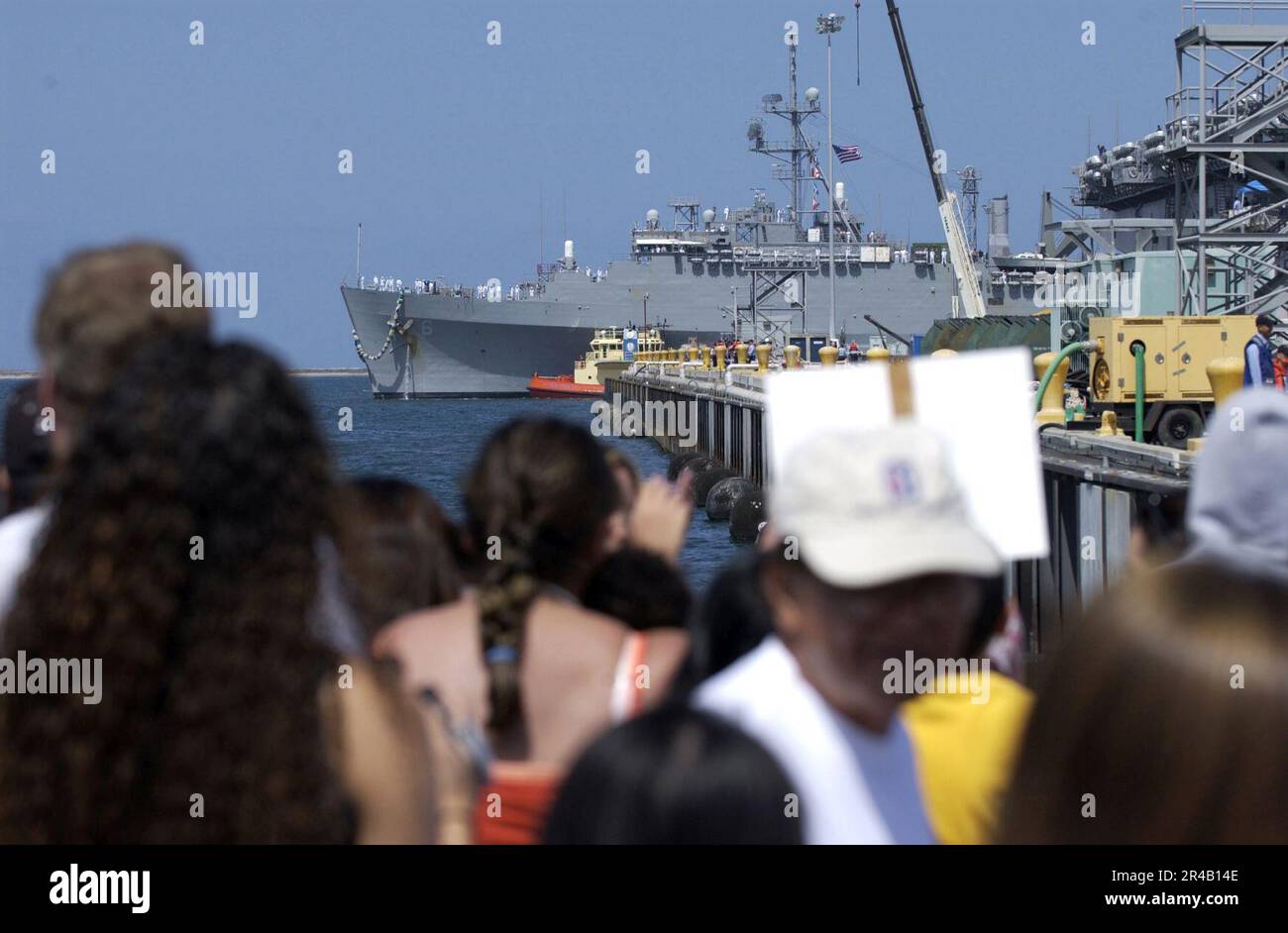 US Navy Families and friends of Sailors assigned aboard the amphibious ...