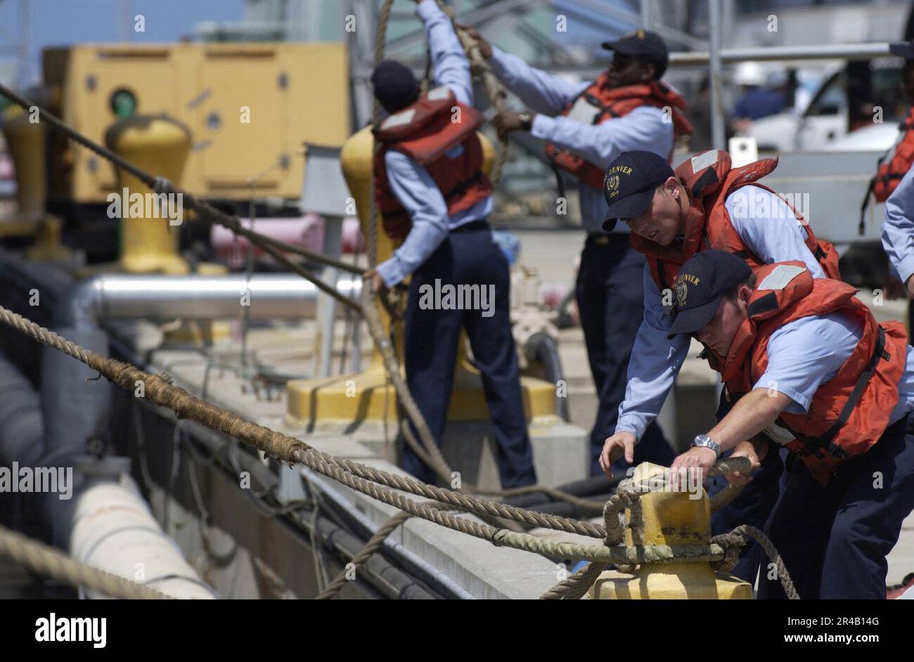 US Navy Line handlers assigned to the amphibious assault ship USS ...
