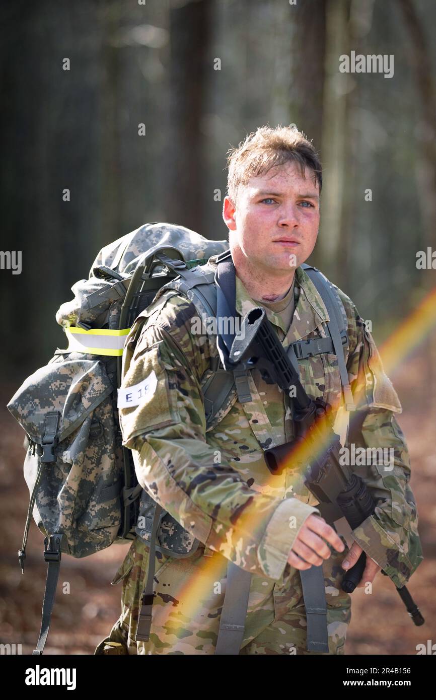A Soldier completes the 12-mile ruck march event Tuesday during the ...