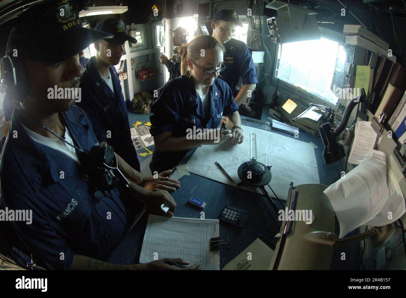 US Navy Quartermaster Seaman and Quartermaster 2nd Class plot a course ...