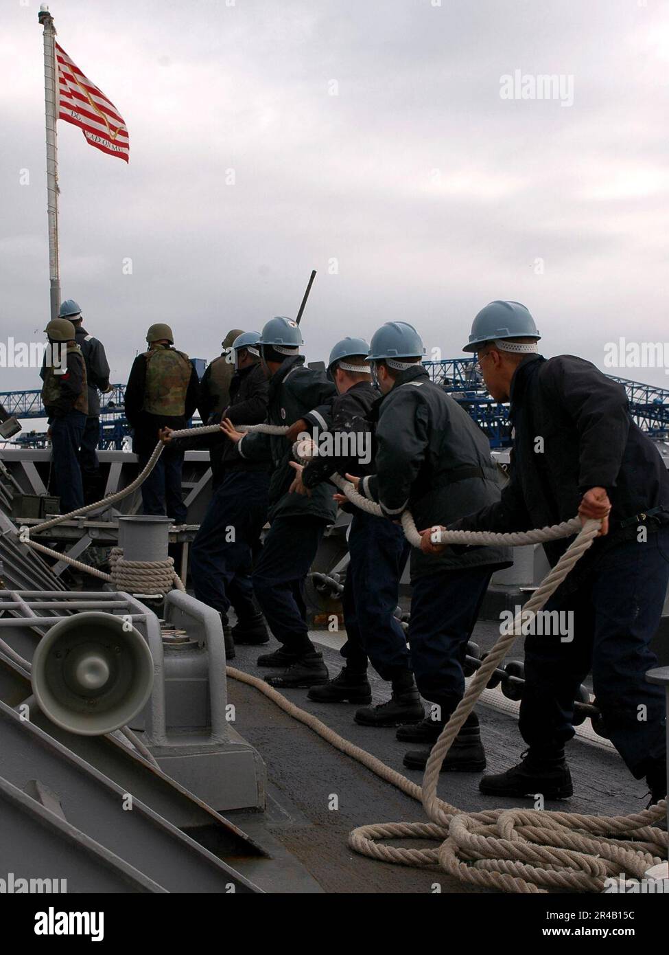 US Navy Sailors stationed aboard the guided missile cruiser USS Anzio ...