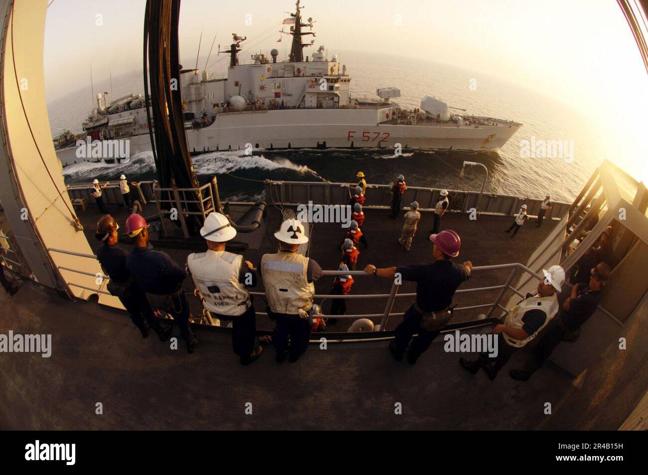 US Navy Sailors aboard the fast combat support ship USS Camden (AOE 2 ...