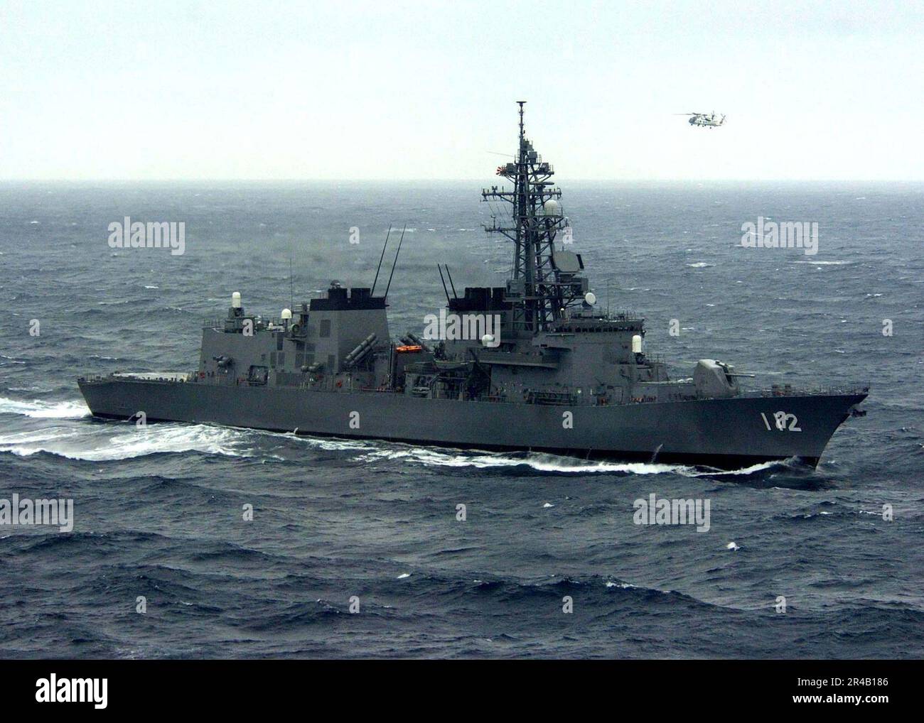 US Navy The Japanese Maritime Self Defense (JDS) ship JDS Akebono (DDG 109) pulls into formation ...