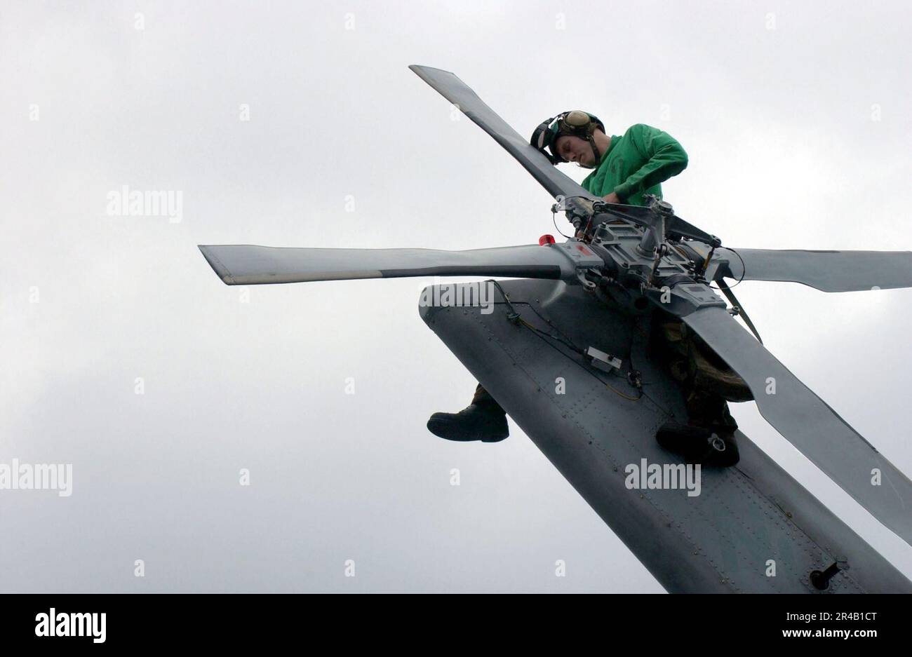 US Navy Aviations Electronics Mate 3rd Class replaces an anti-collision ...