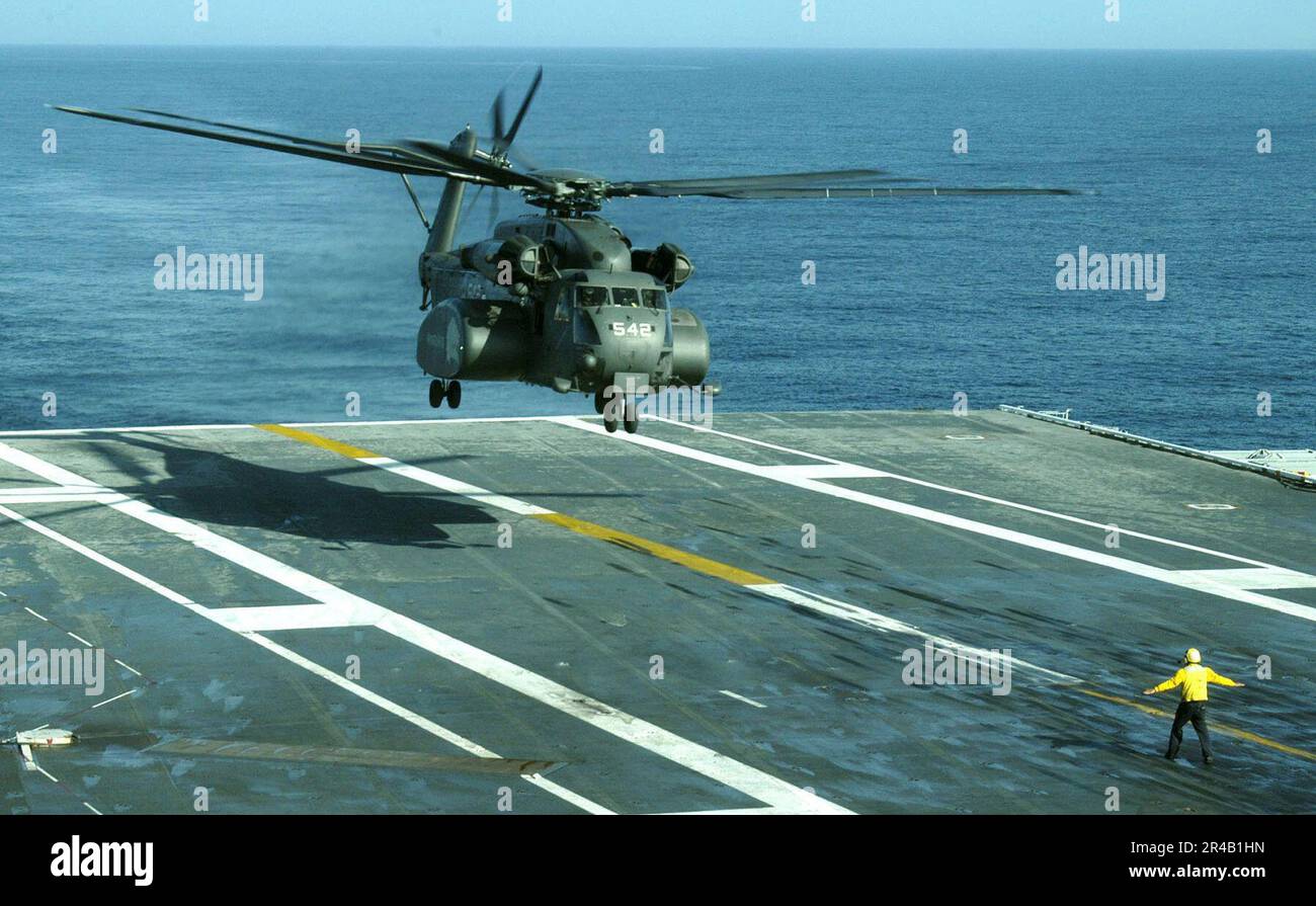 US Navy An aircraft handler assigned to the Air Department aboard USS ...