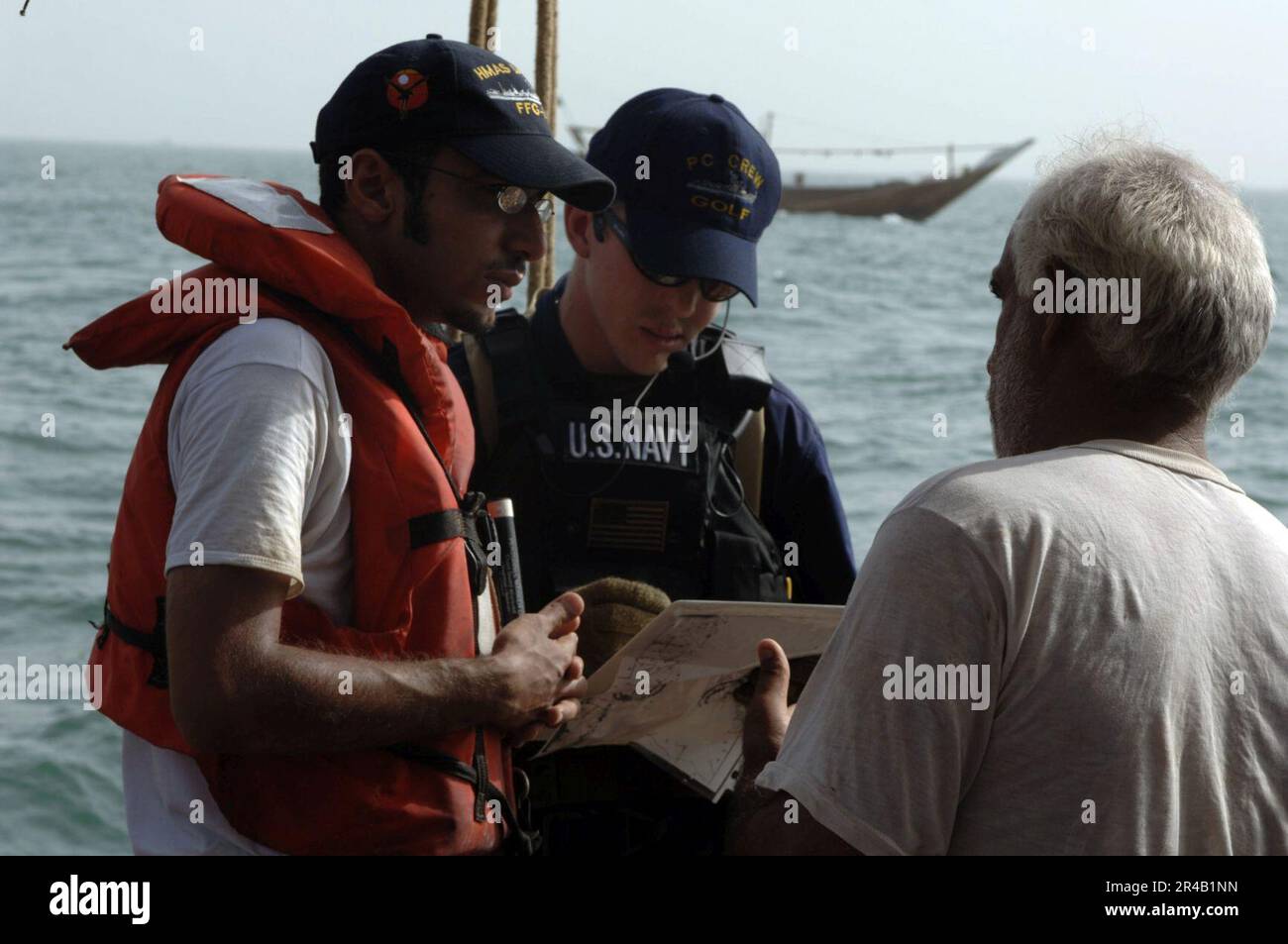 US Navy Sailors assigned to the coastal patrol boat USS Chinook (PC 9 ...
