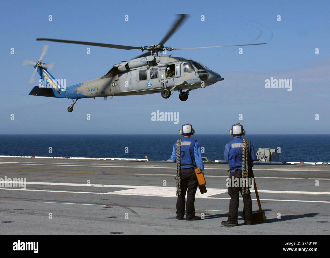 US Navy Air Department Sailors prepare for an MH-60S Seahawk helicopter ...