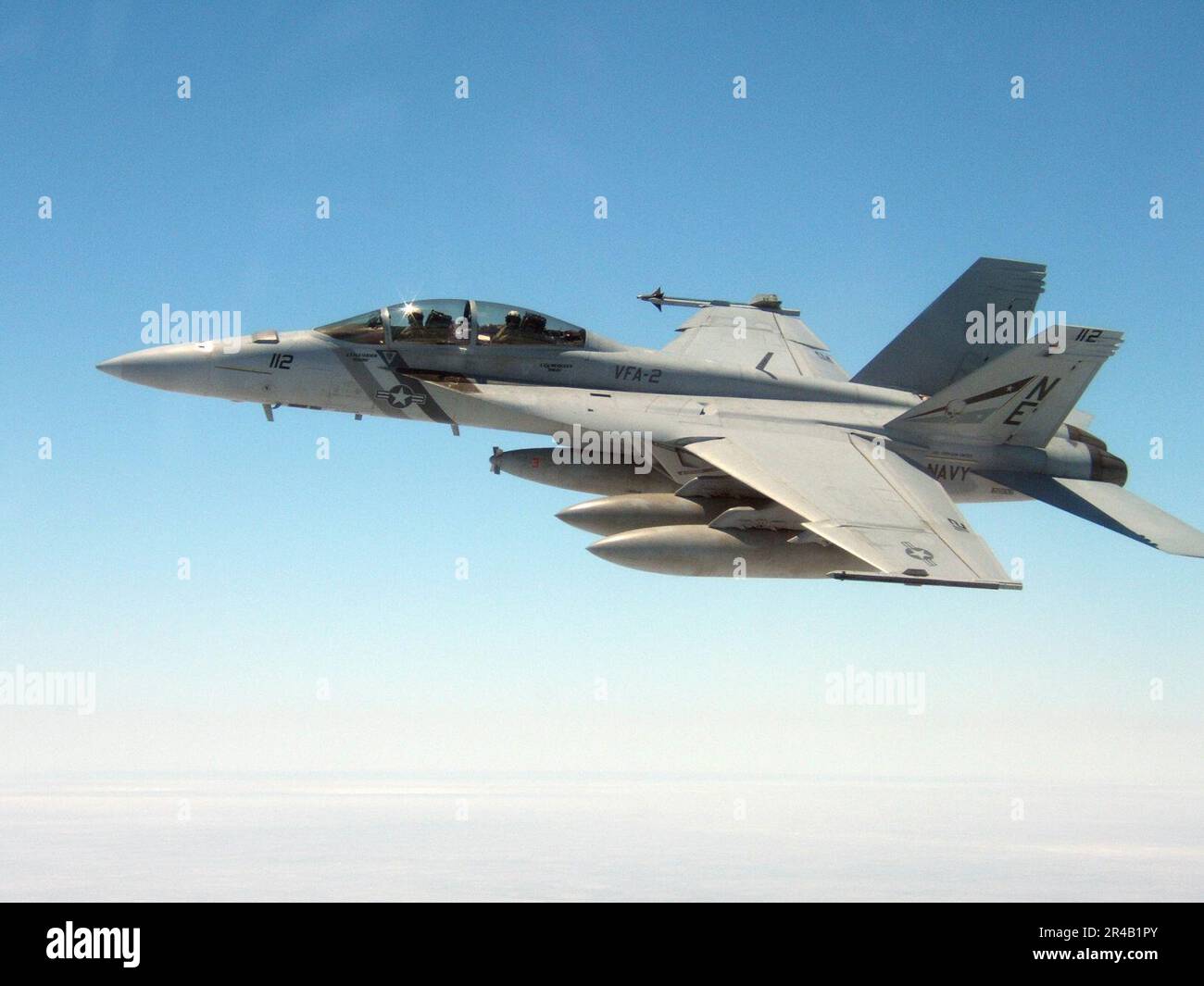 US Navy An F-A-18F Super Hornet conducts a training flight over the ...