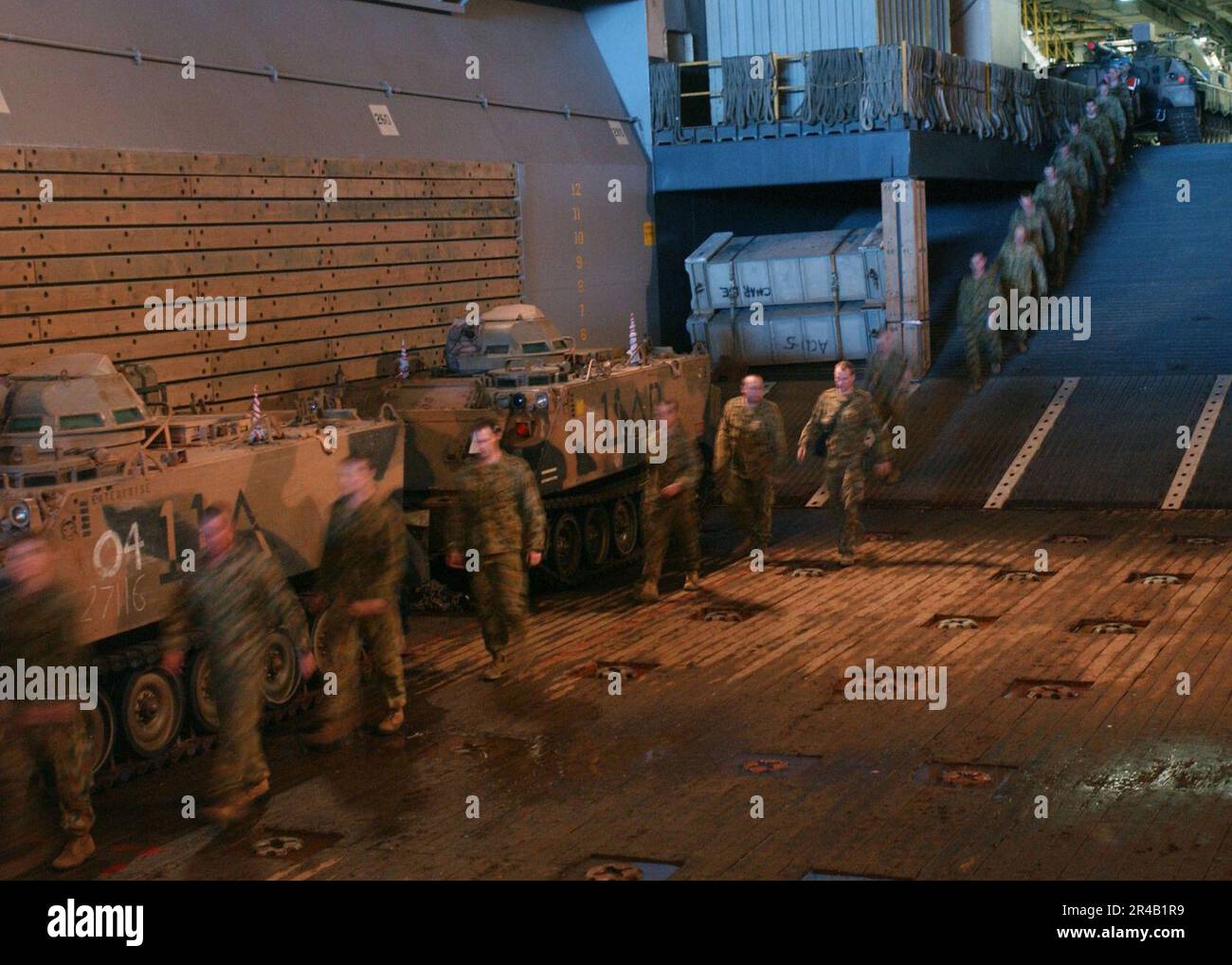 US Navy Soldiers from the 1st Battalion Australian Regiment are led ...