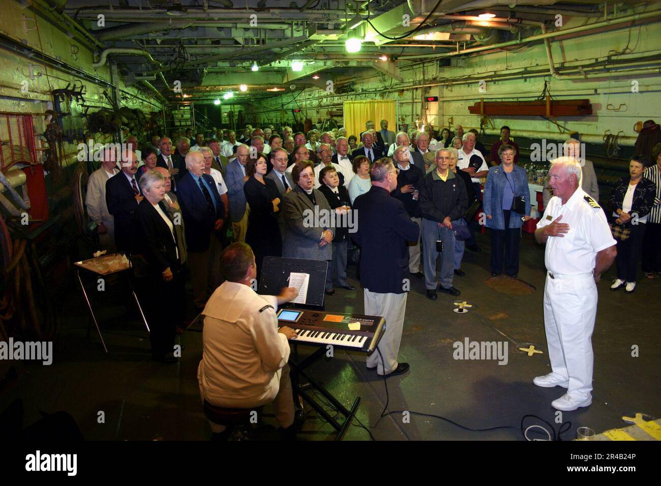 US Navy Musician 2nd Class of Navy Band Northeast, seated at keyboard ...