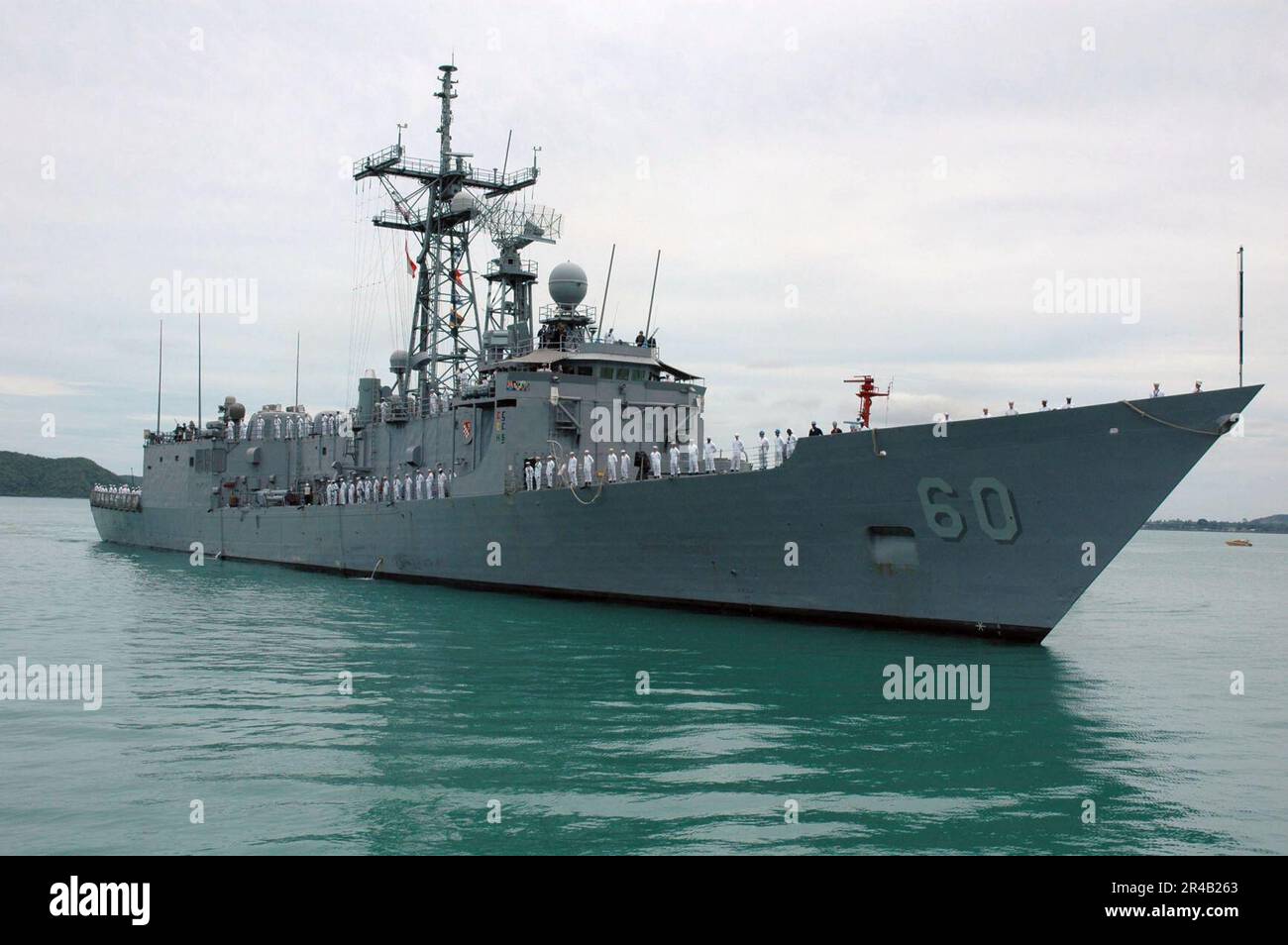 US Navy Sailors aboard the guided missile frigate USS Rodney M. Davis ...