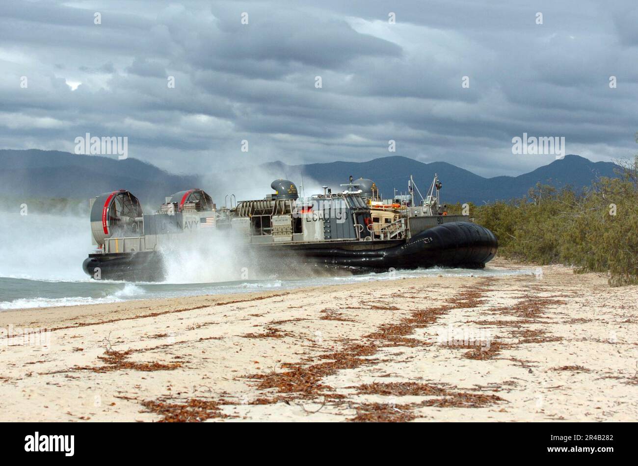 US Navy A U.S. Navy Landing Craft, Air Cushion (LCAC), assigned to ...