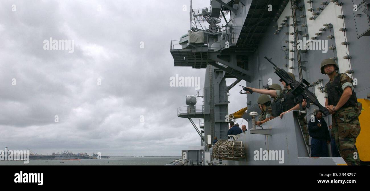 US Navy Sailors assigned to the security force aboard the Nimitz-class ...