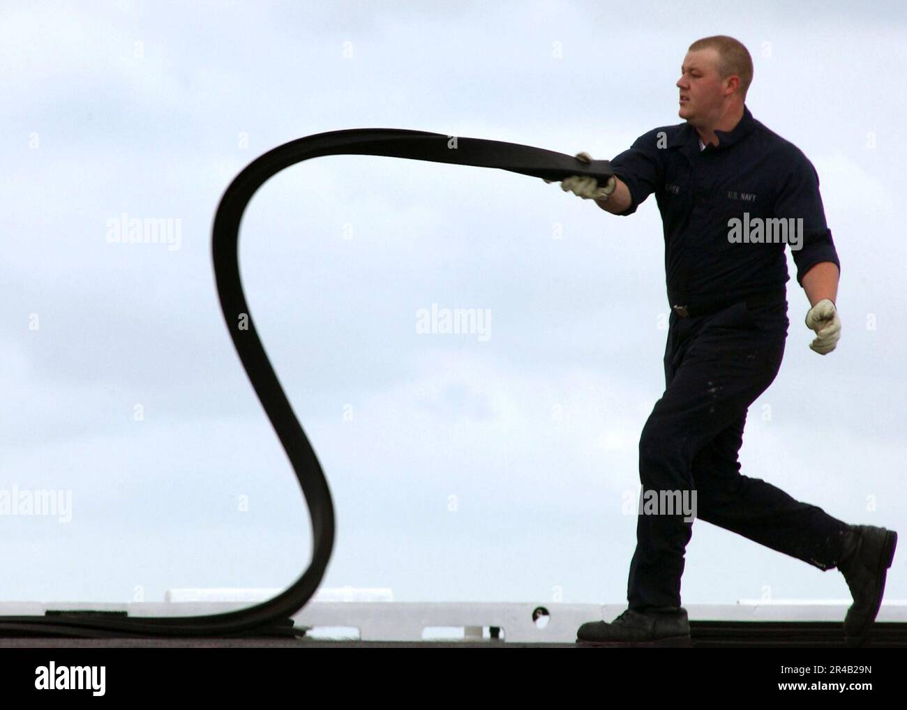 US Navy A Sailor assigned to Air Department aboard the Nimitz-class ...