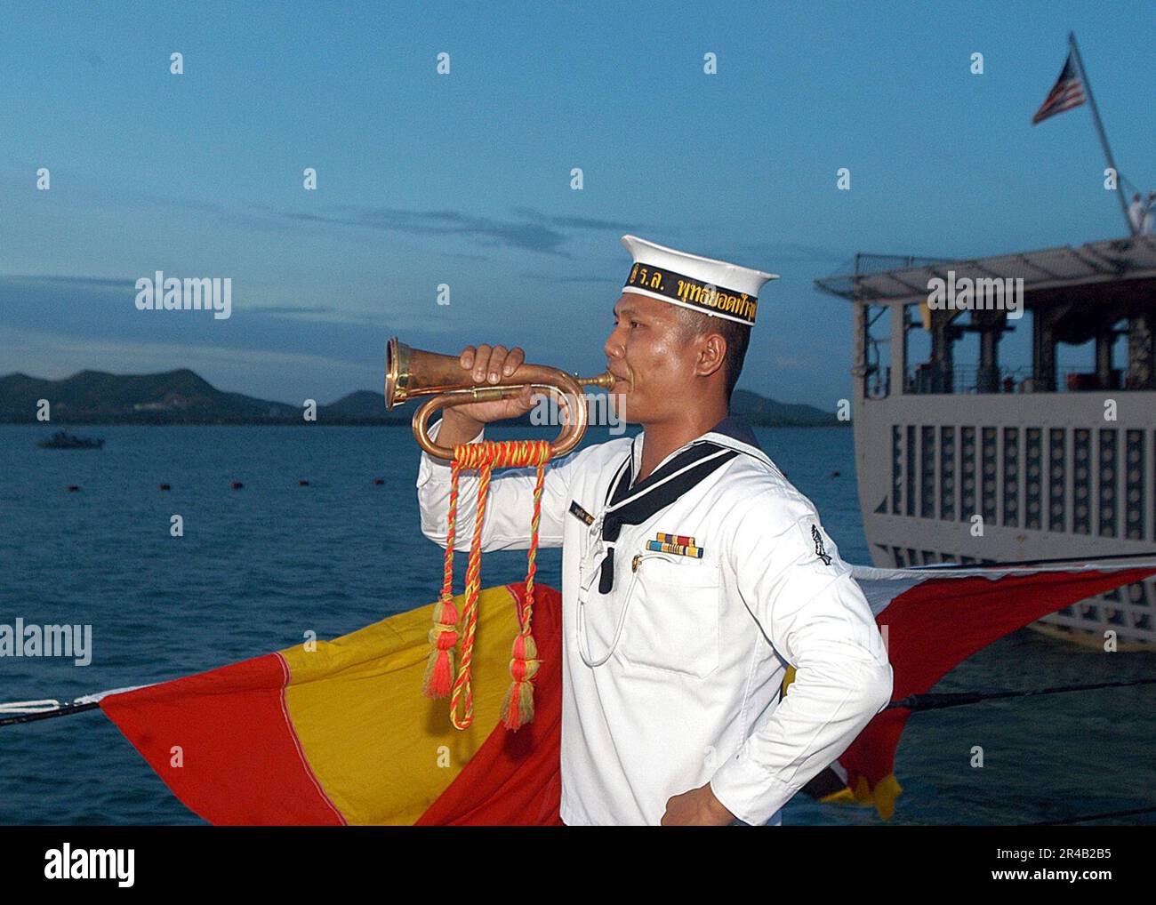 US Navy A Royal Thai Navy bugler aboard HTMS Phutthayotfa Chulalok ...