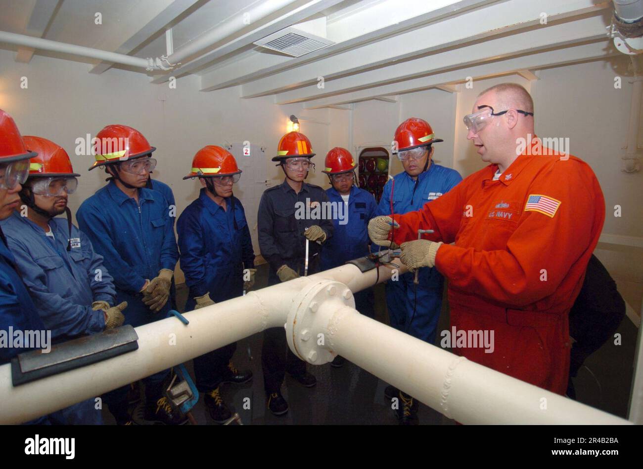 US Navy Damage Controlman 1st Class trains Japan Maritime Self Defense ...