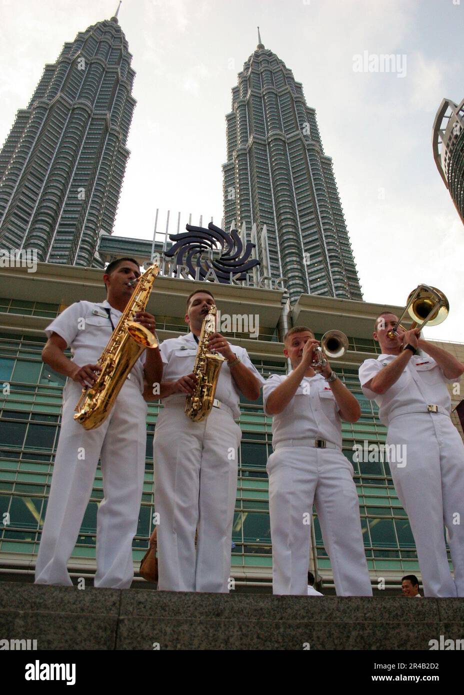 US Navy Members of the Pacific Fleet Band play for an audience near the ...