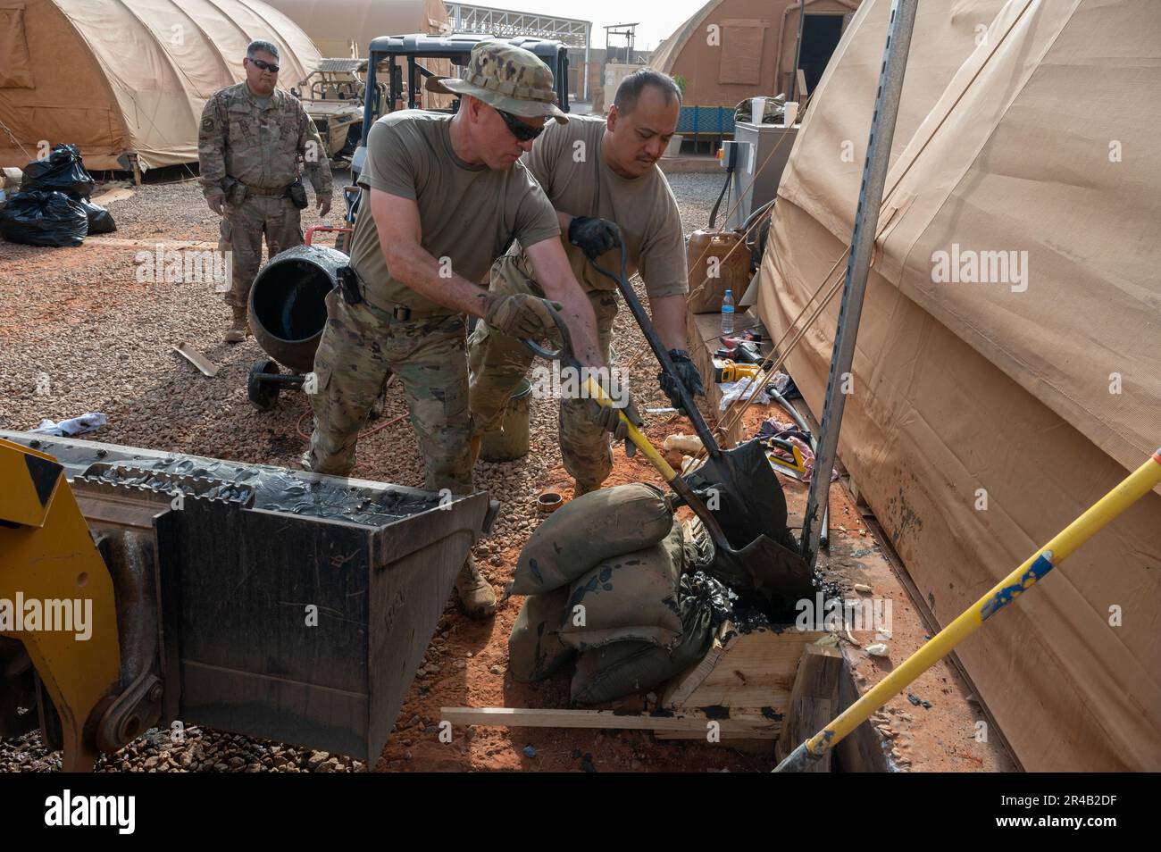 U.S. Air Force Senior Master Sgt. Kevin Lake (left) and Master Sgt ...