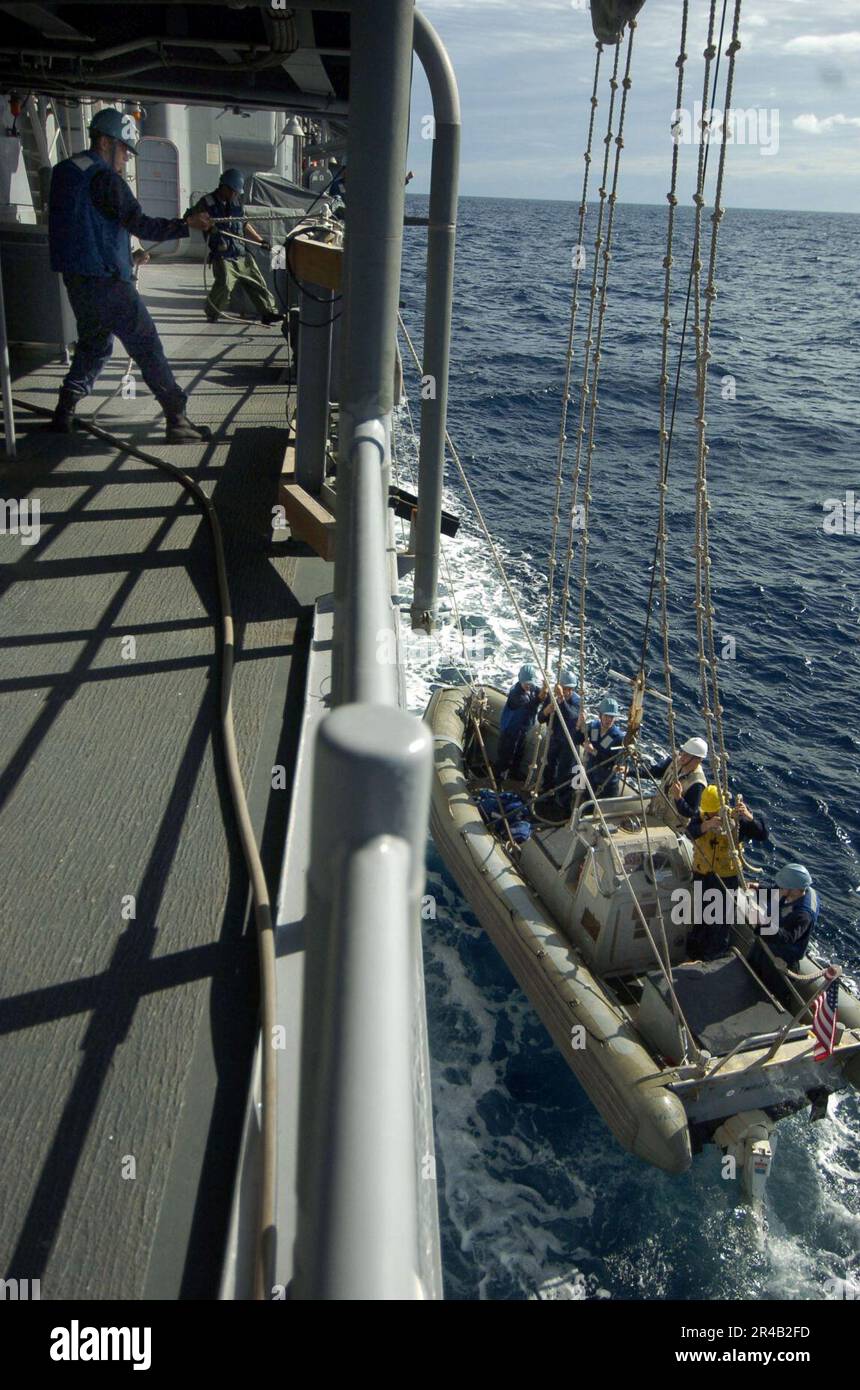 US Navy Deck department Sailors assigned to the guided missile cruiser ...